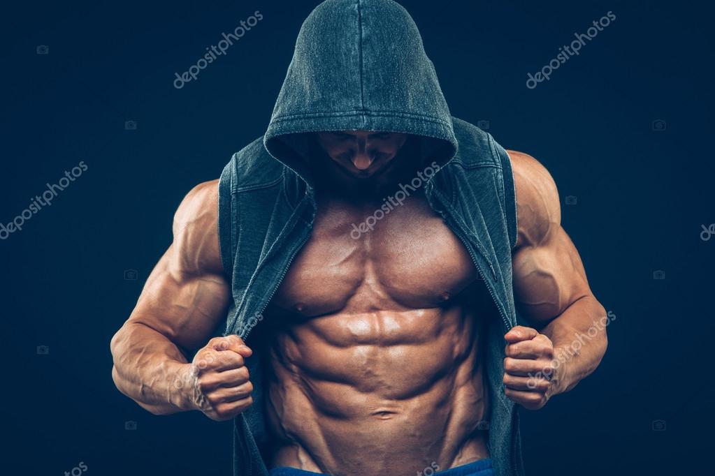 Man with muscular torso. Strong Athletic Men Fitness Model Torso ...