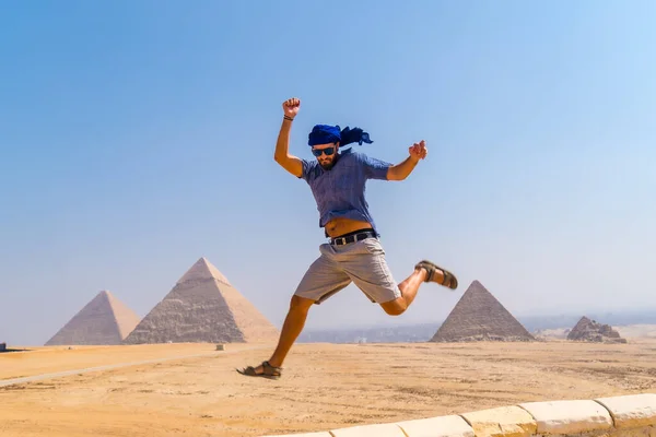 Happy tourist and pyramid Stock Photos, Royalty Free Happy tourist and ...