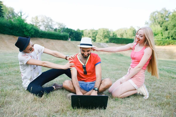 Technology and people concept - group friends with tablet pc computers ...