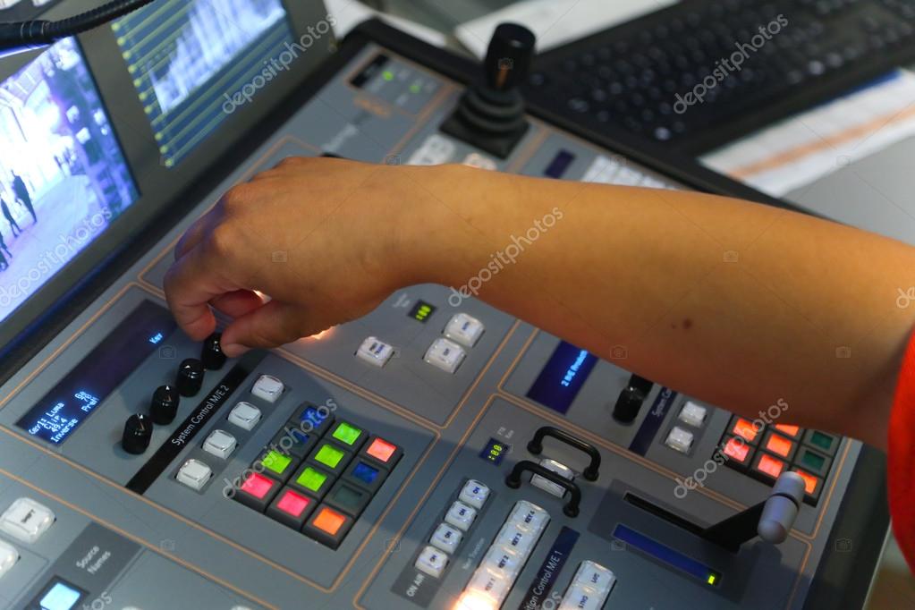 TV engineer working editing with video and audio mixer — Stock Photo ...