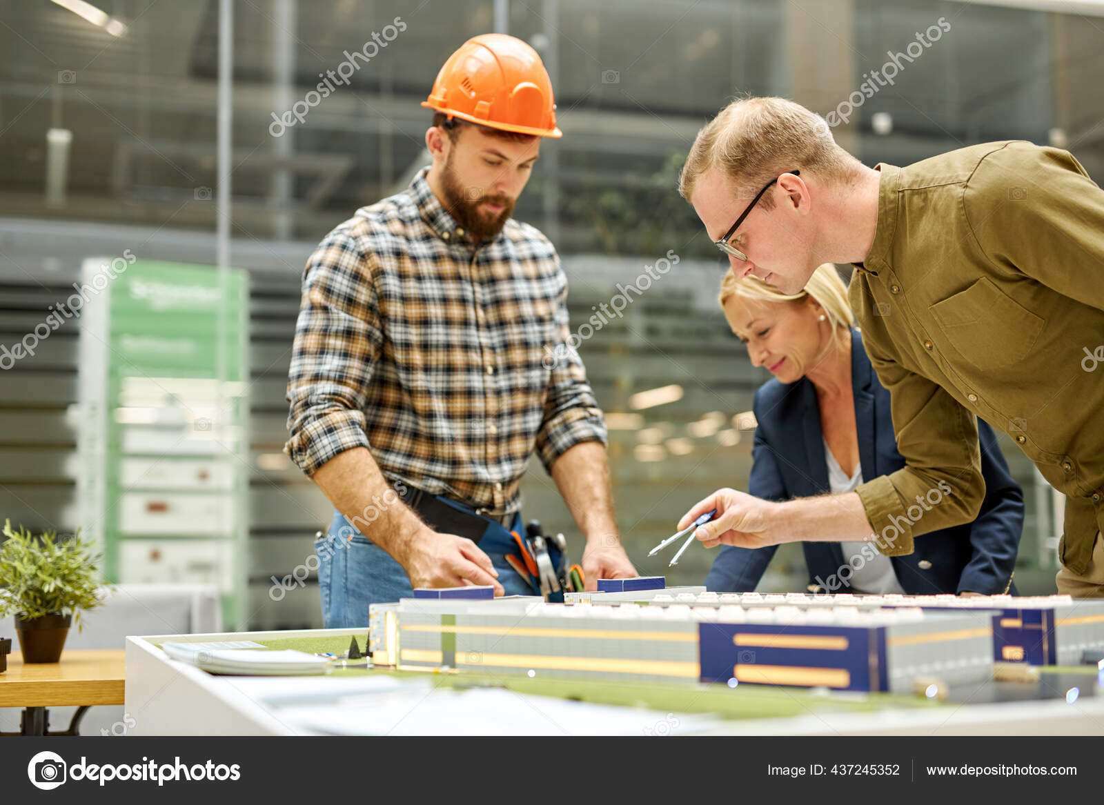 Three architects concentrated on work — Stock Photo © romanchazov27 ...