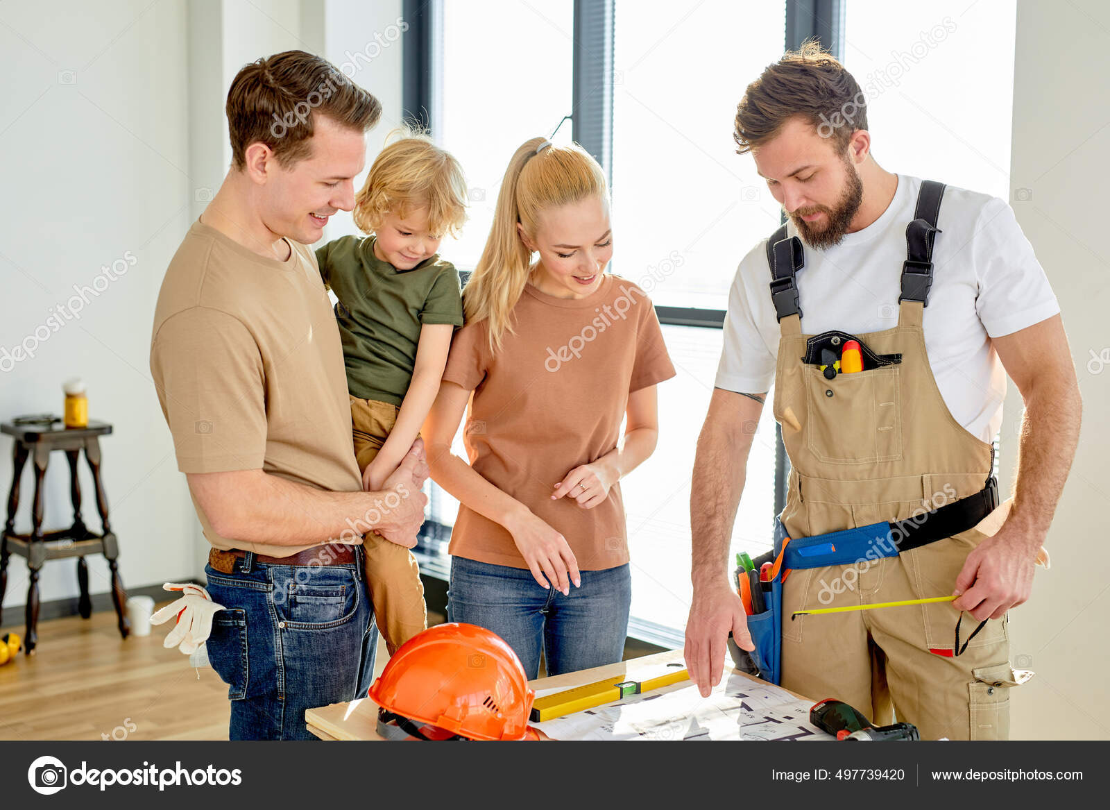 Confident Affable Builder Man In Overall Explain House Design To Family ...