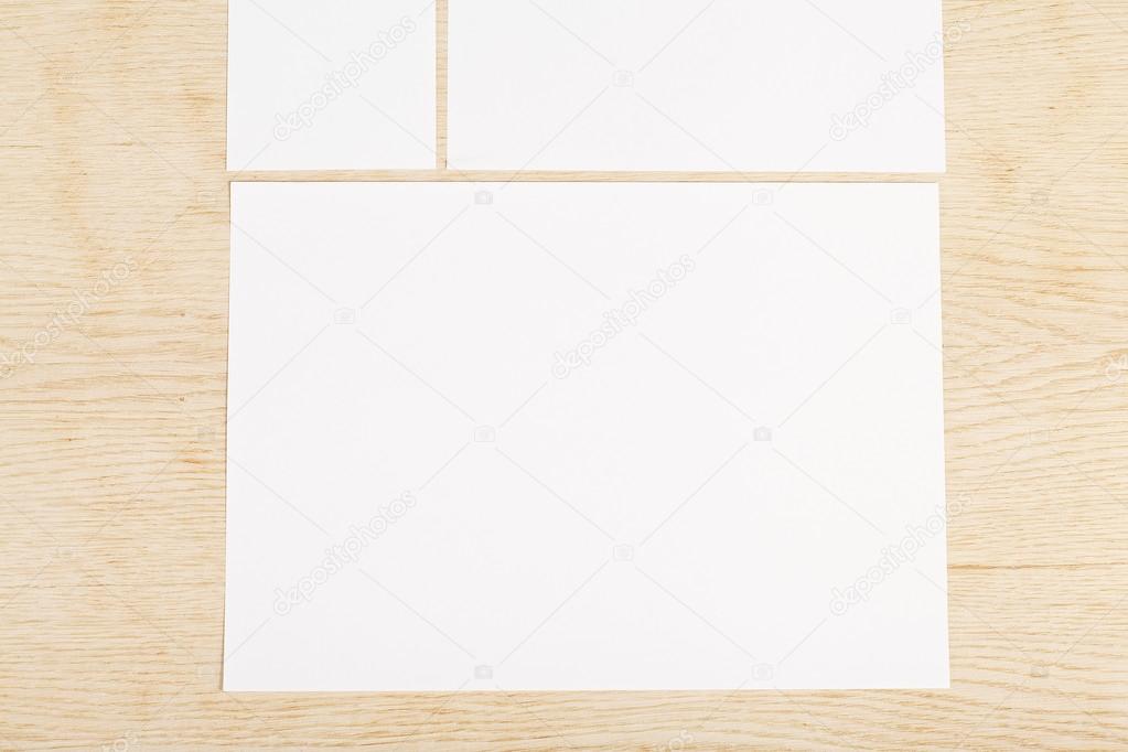 Blanks of empty paper on a wooden surface. Stock Photo by ©tacilatan ...
