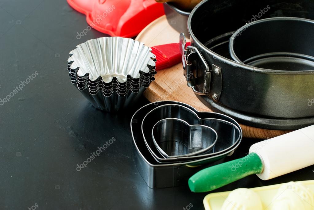 Appliances for baking closeup on wooden background Stock Photo by ©vi ...