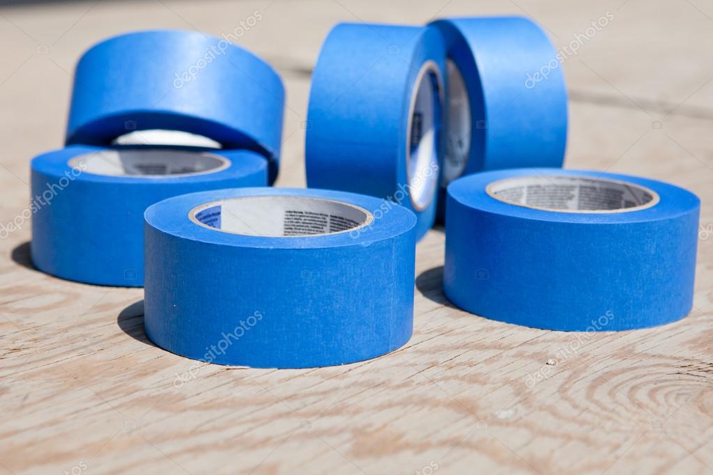 Blue tapes over plywood — Stock Photo © RDStockPhotos #88851100