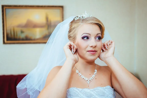 Beautiful caucasian bride getting ready for the wedding ceremony Stock ...