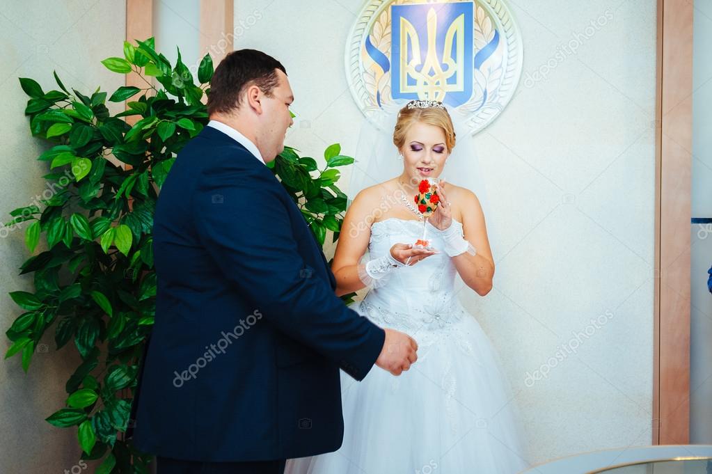 Wedding ceremony. Registry office. A newly-married couple signs the ...