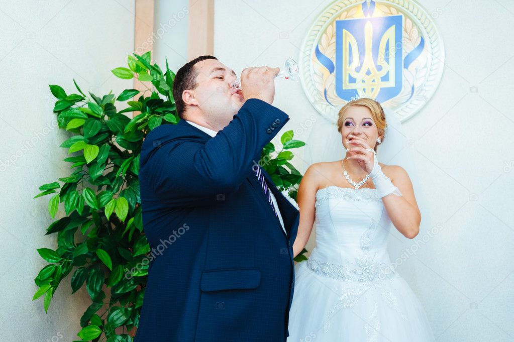 Wedding ceremony. Registry office. A newly-married couple signs the ...