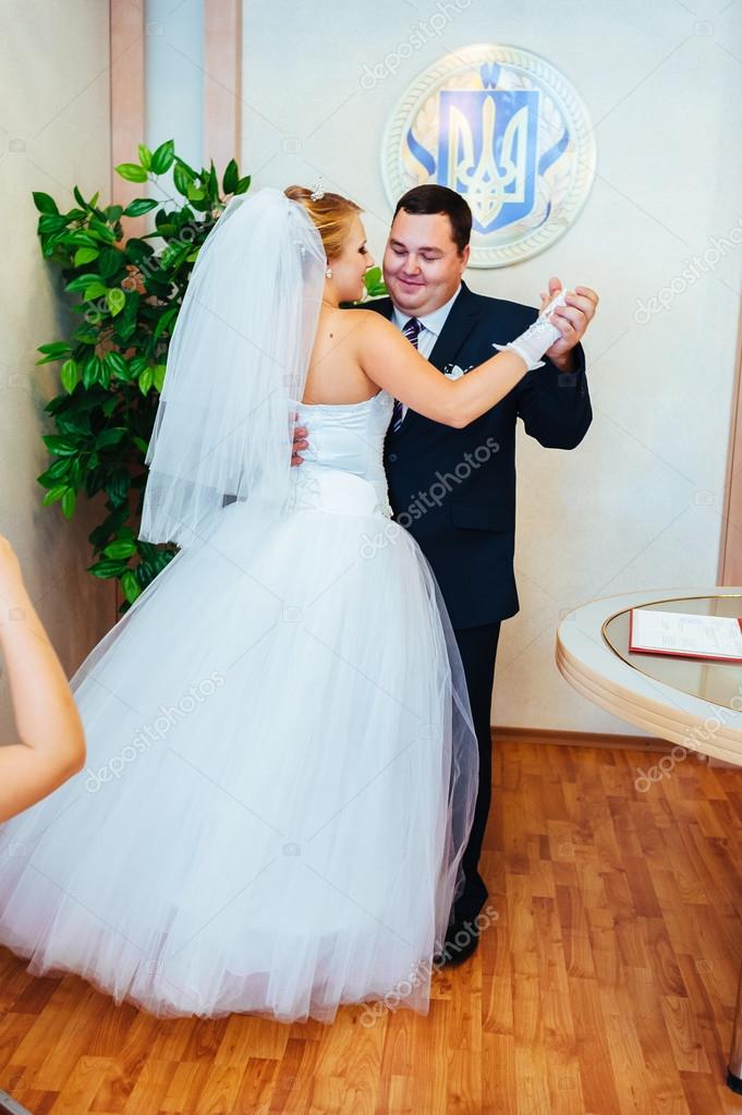 Wedding ceremony. Registry office. A newly-married couple signs the ...