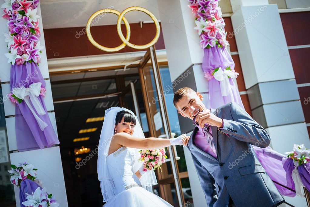 Wedding ceremony. Registry office. A newly-married couple signs the ...