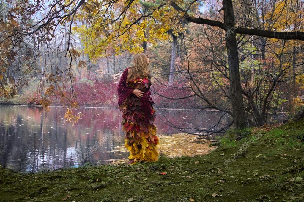 Autumn witch in forest — Stock Photo © Tntk #90439604