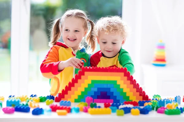 Children playing with colorful blocks. Stock Photo by ©FamVeldman 119853784