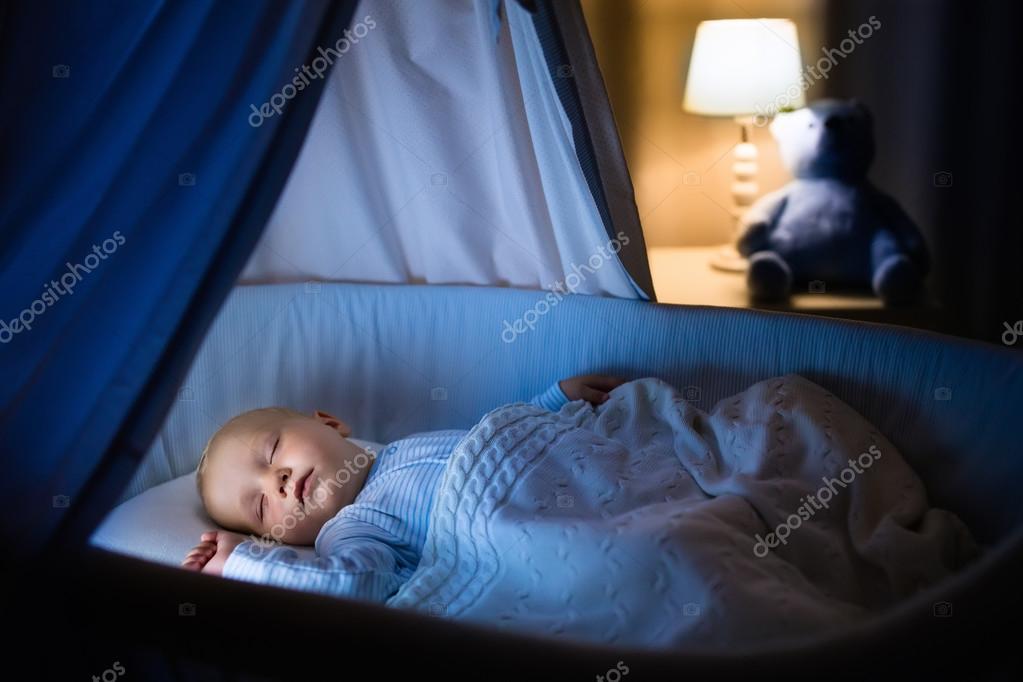 Baby boy sleeping at night — Stock Photo © FamVeldman #123250162