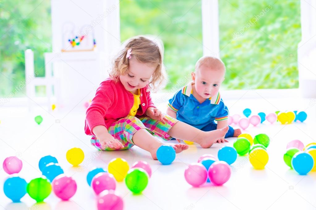 Children playing at day care — Stock Photo © FamVeldman #63416925