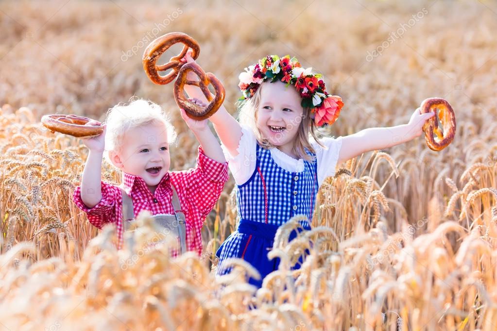 Kids in Bavarian costumes in wheat field Stock Photo by ©FamVeldman ...