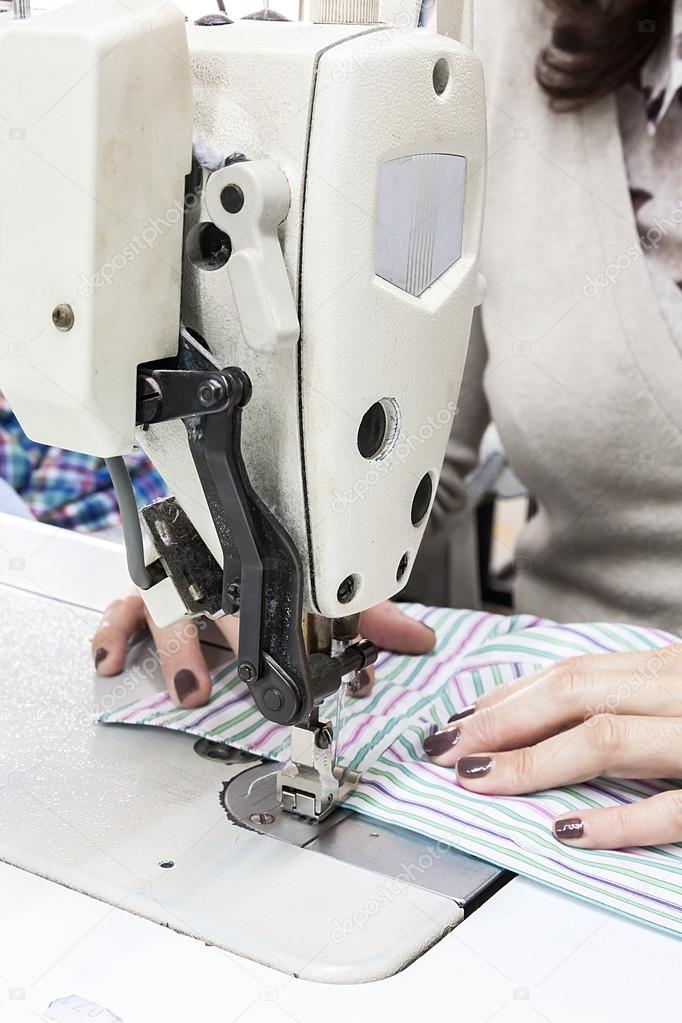 Industrial sewing machines with sewing machine operator — Stock Photo ...