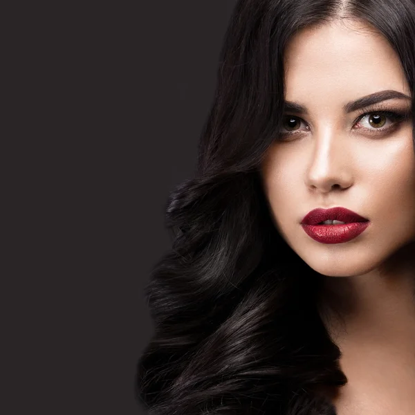Beautiful Brunette Model Curls Classic Makeup And Red Lips With A