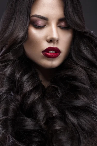 Beautiful Brunette Model Curls Classic Makeup And Red Lips With A