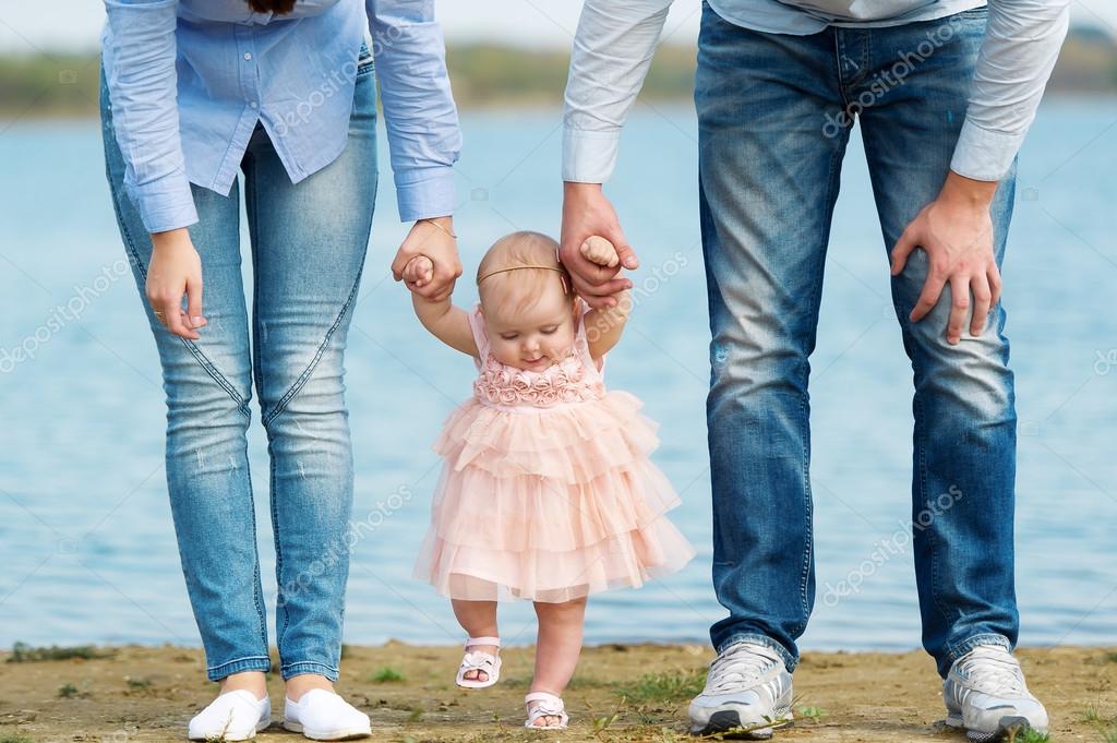 First steps of the little girl — Stock Photo © avk78 #97818120