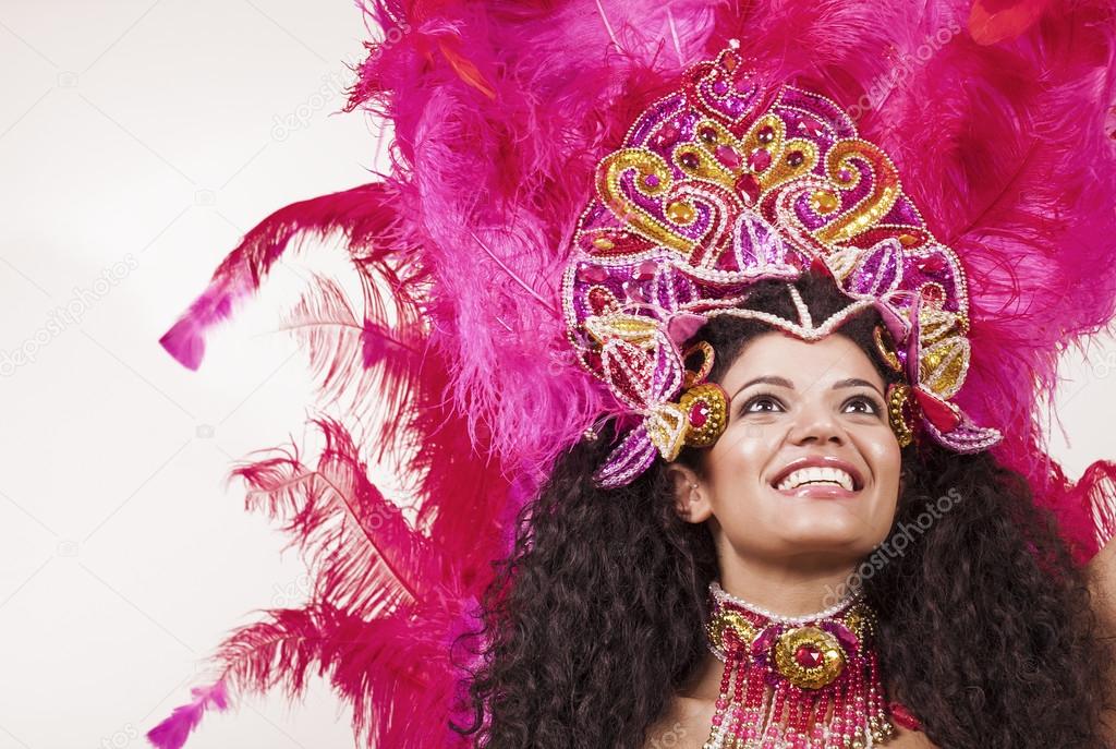 Cheerful samba dancer wearing pink costume — Stock Photo © patronestaff ...