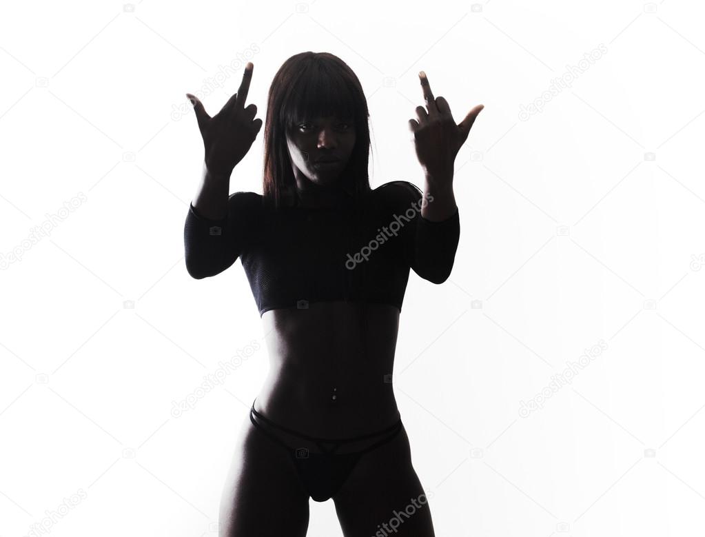 Model Silhouette Portrait While Making Middle Finger Gestures Stock