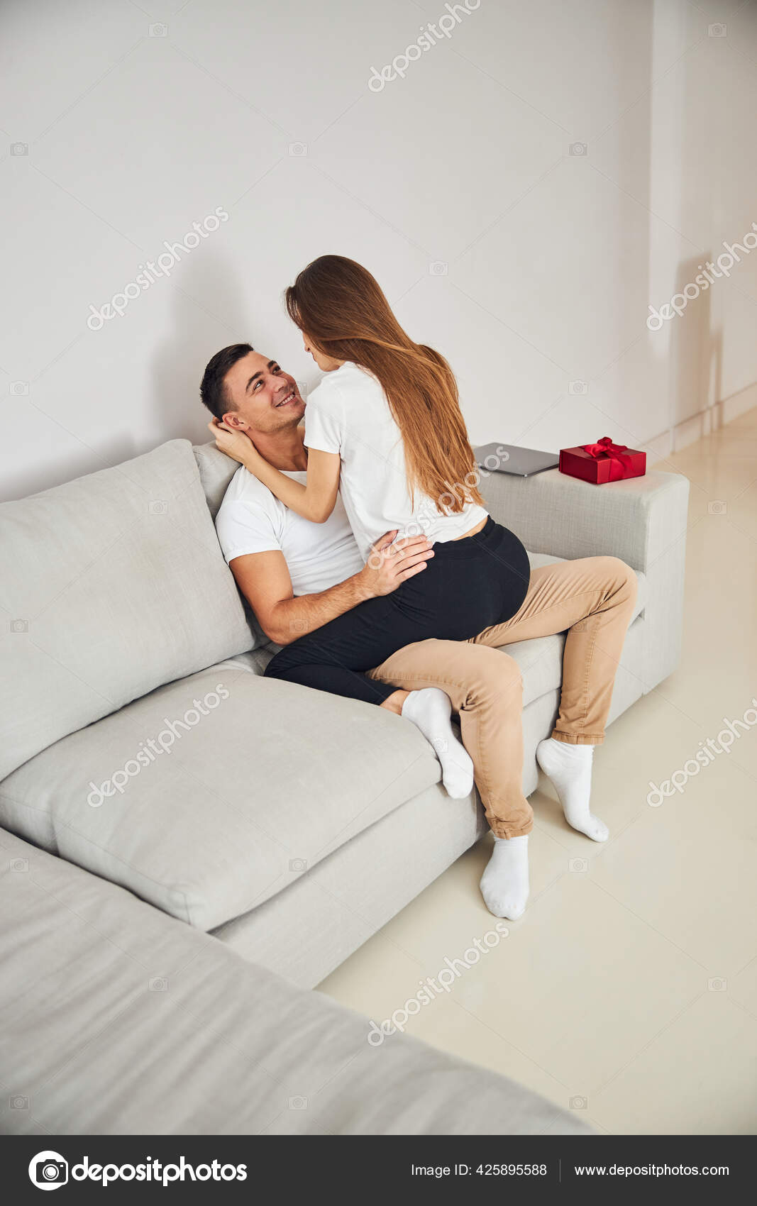 Young woman and her husband gazing into each others eyes — Stock Photo © yacobchuk1 #425895588