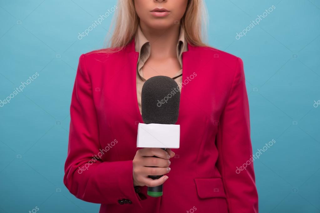 Very beautiful TV presenter Stock Photo by ©yacobchuk1 55239919