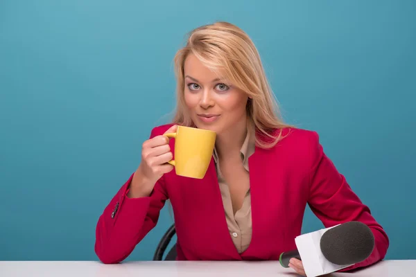 Very beautiful TV presenter Stock Photo by ©yacobchuk1 55365183