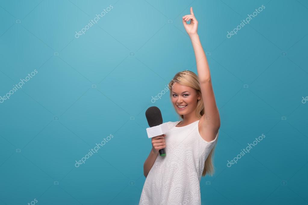 Very beautiful TV presenter Stock Photo by ©yacobchuk1 55394315