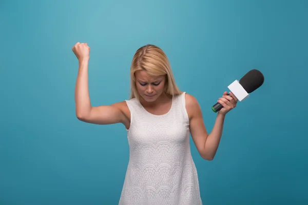 Very beautiful TV presenter Stock Photo by ©yacobchuk1 55394315