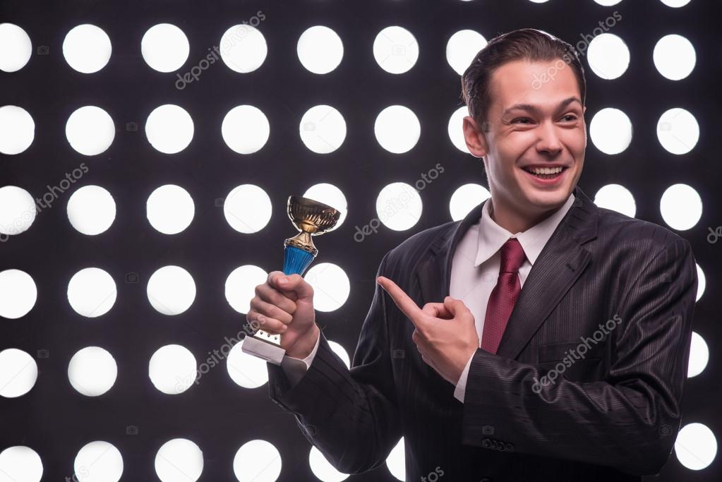 Attractive star TV presenter Stock Photo by ©yacobchuk1 55533679