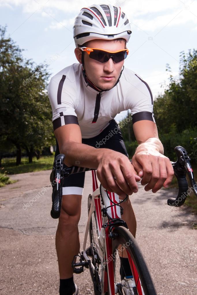 Man riding a bike — Stock Photo © yacobchuk1 #56073973