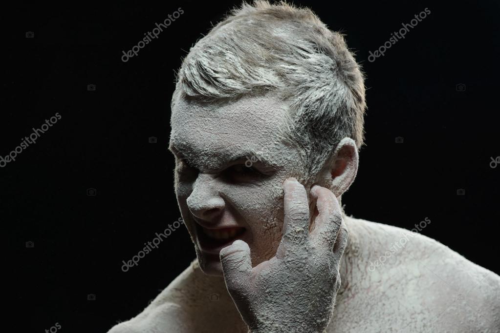 Handsome man covered with powder itching Stock Photo by ©yacobchuk1 ...