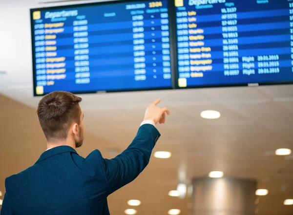 Handsome man in the airport Stock Photo by ©yacobchuk1 65476435