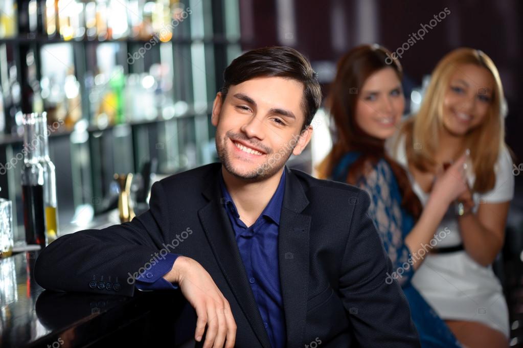 Young man in the bar — Stock Photo © yacobchuk1 #70035931