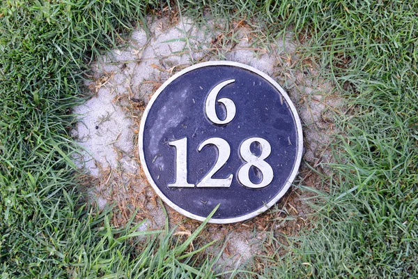 Distance yardage markers on golf course - Stock Image - Everypixel