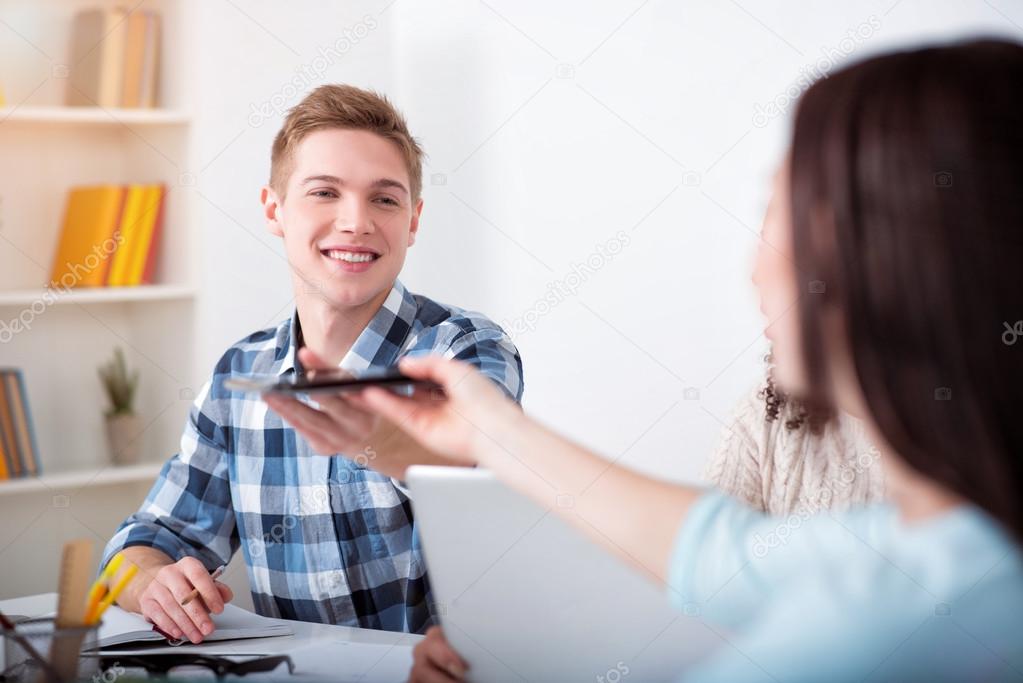 Students helping each other Stock Photo by ©Dmyrto_Z 109075204