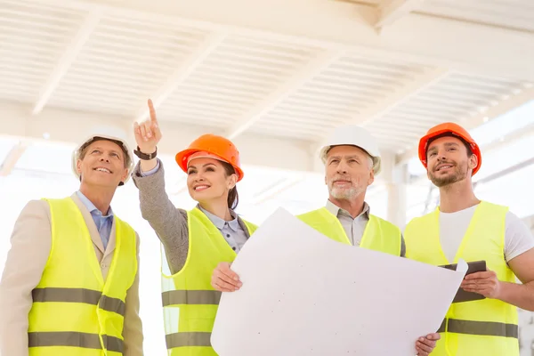 Construction workers. Team of project — Stock Photo © Dmyrto_Z #111727036