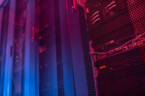 Server rack cluster in a data center (shallow DOF; color toned i Stock ...