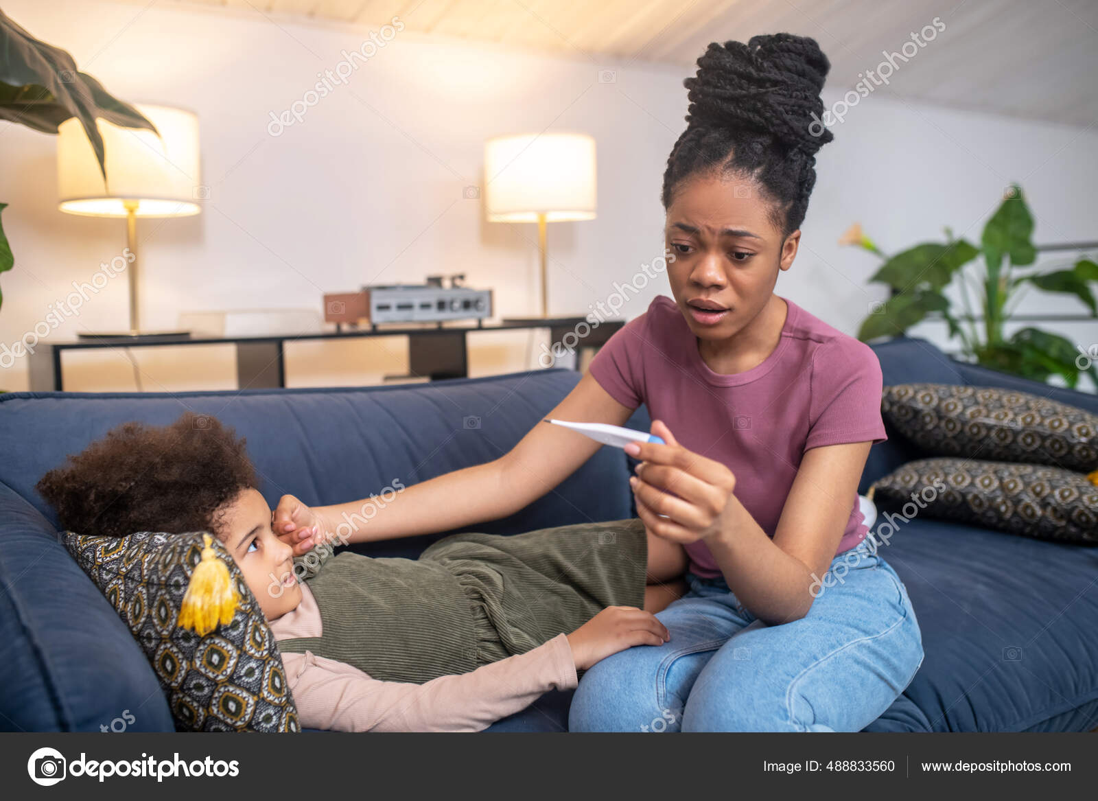 Shocked mom with thermometer and lying little girl — Stock Photo ...
