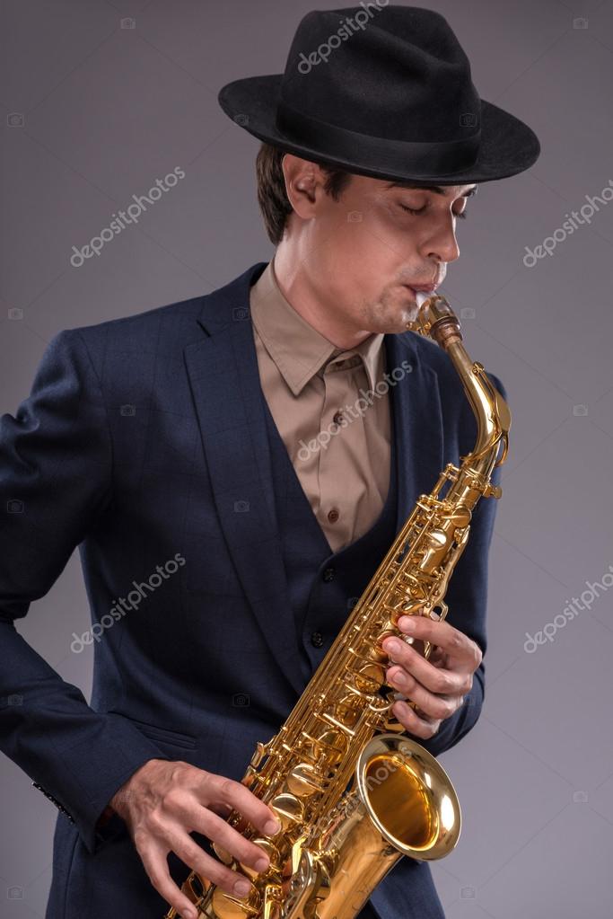 Handsome young jazz man — Stock Photo © Dmyrto_Z #55480527