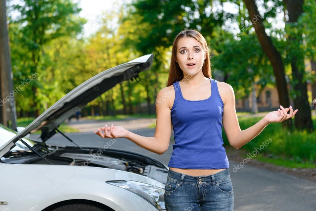 Pretty confused woman with opened arms Stock Photo by ©Dmyrto_Z 74594053