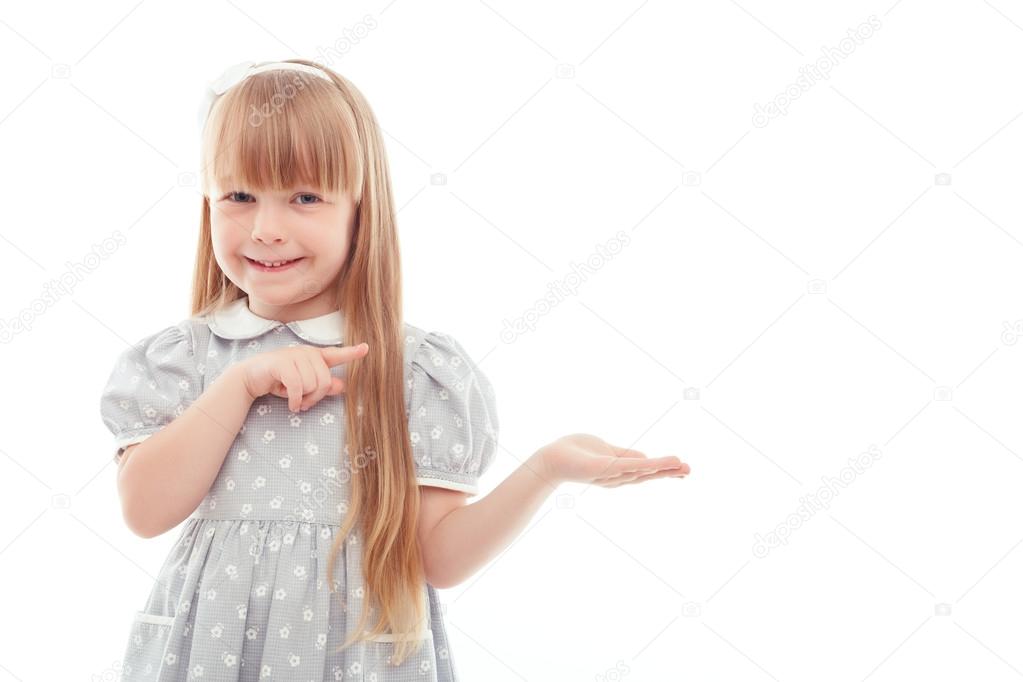 Surprised little girl pointing left — Stock Photo © Dmyrto_Z #77151683