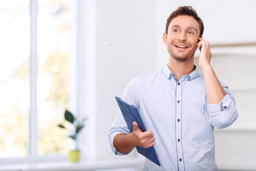 Professional realtor holding folder — Stock Photo © Dmyrto_Z #84837600