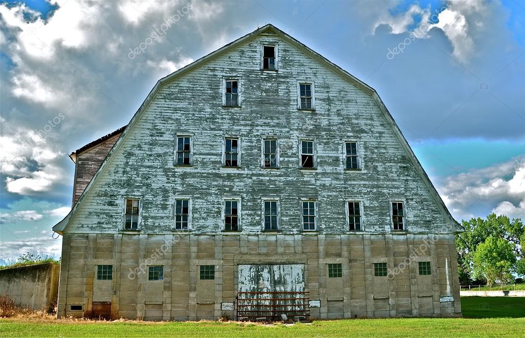 Huge white barn — Stock Photo © fiskness #63834251