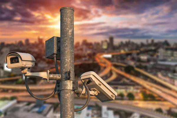 CCTV cameras, security cameras. With the backdrop tail lights bl ...