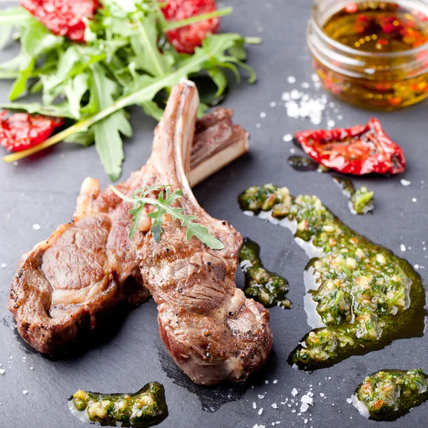 Grilled meat, mutton, lamb rack with fresh salad. - Stock Image ...