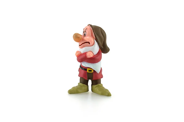 Photos: grumpy dwarf | Grumpy dwarfs toy character – Stock Editorial ...