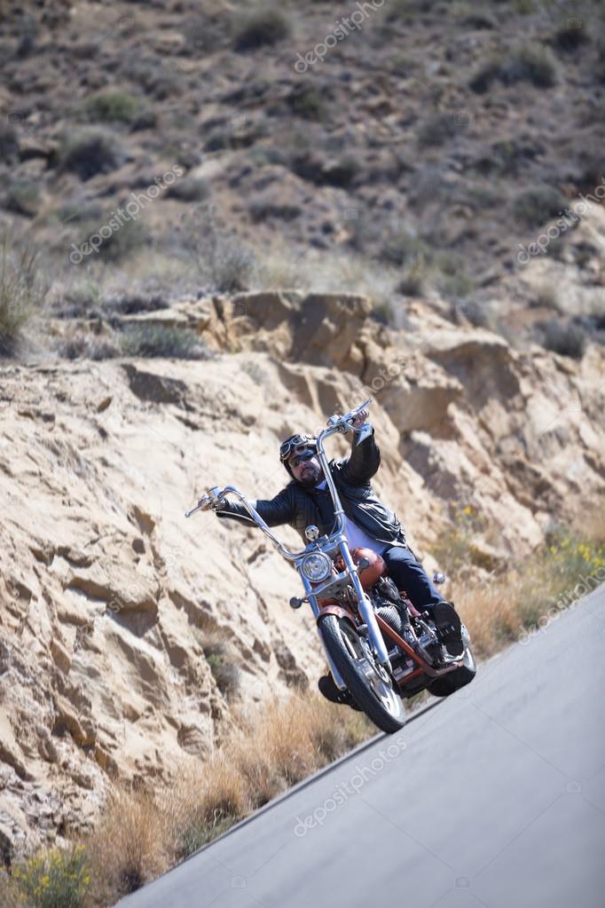 Driving a chopper motorcycle — Stock Photo © Click_and_Photo #67020835