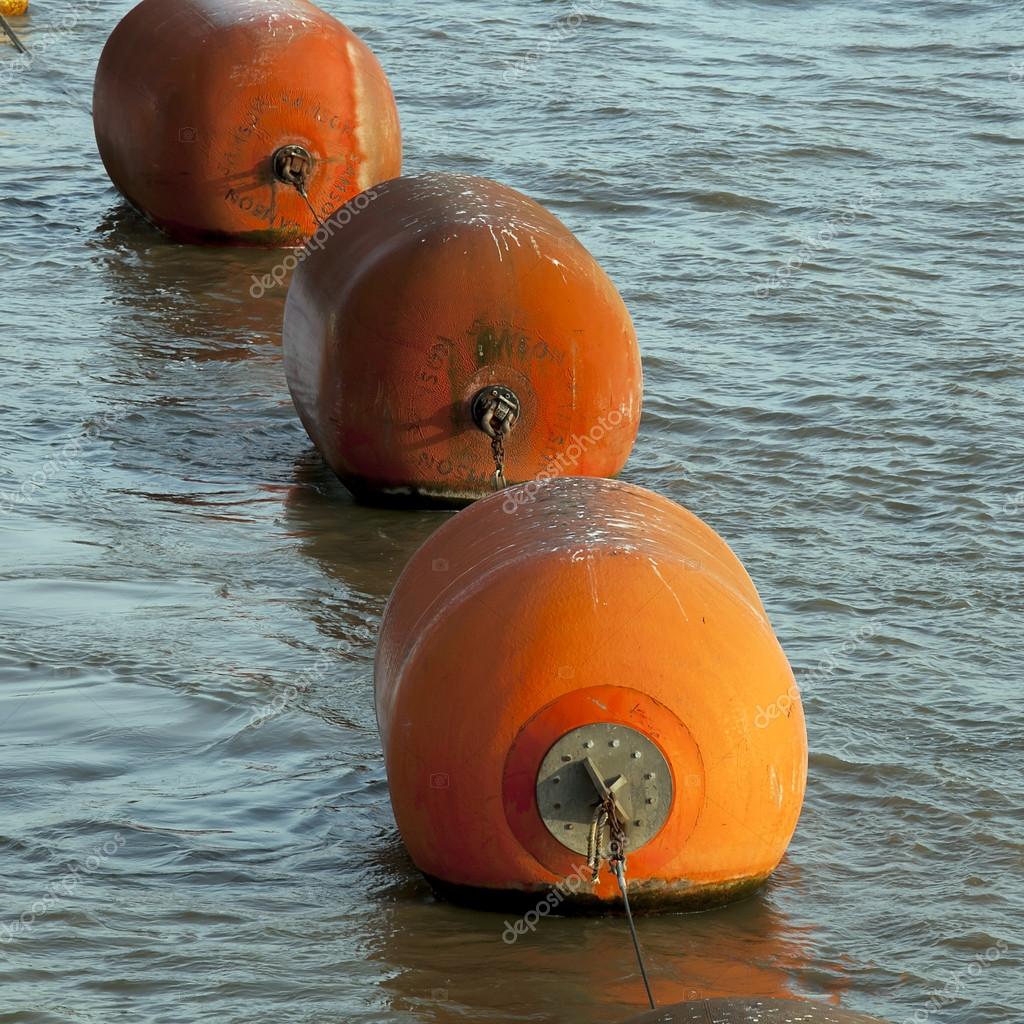 Three Orange Buoys — Stock Photo © elenarostunova #63402059